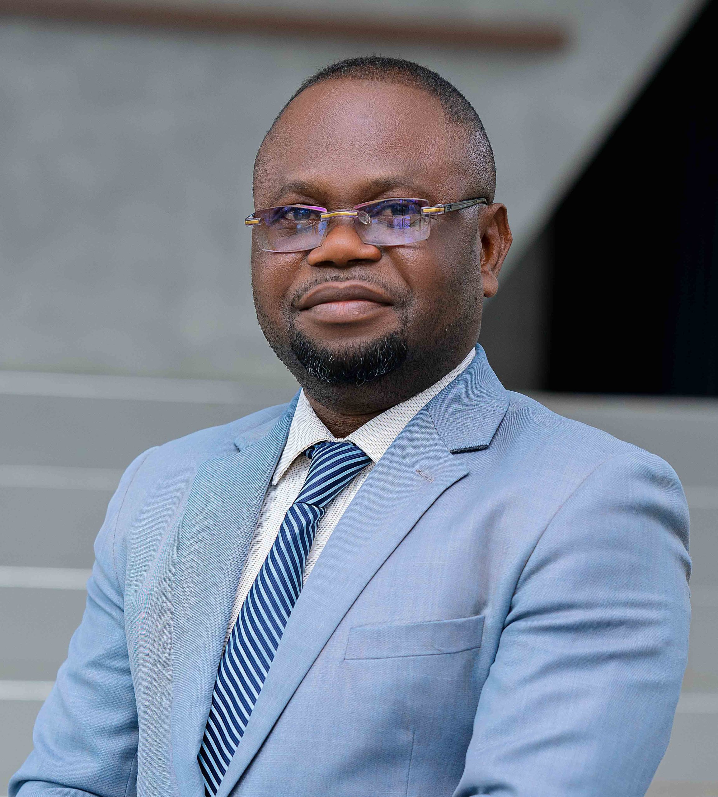 Commissioner Emmanuel Adelbert Booto Nkaimana - COMESA Competition ...